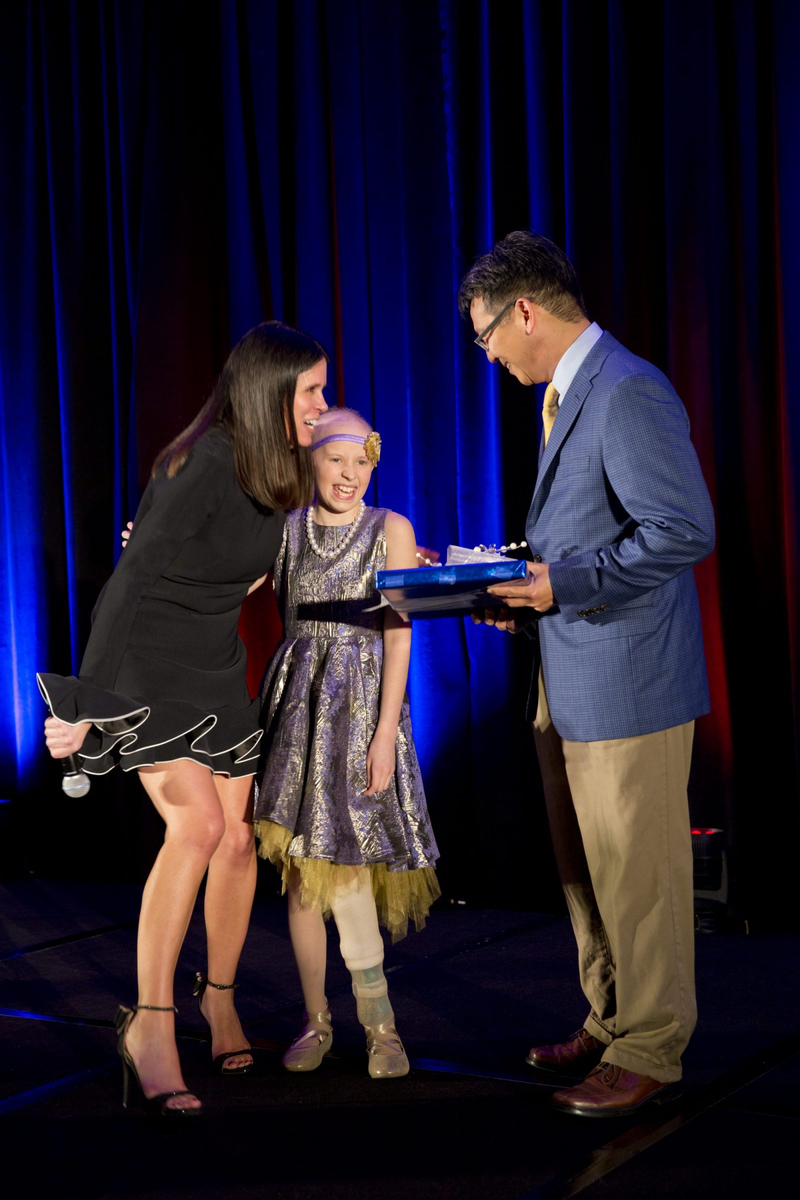 Beating the Evil Cancer Demon Earns Families a Night on the Catwalk and ...