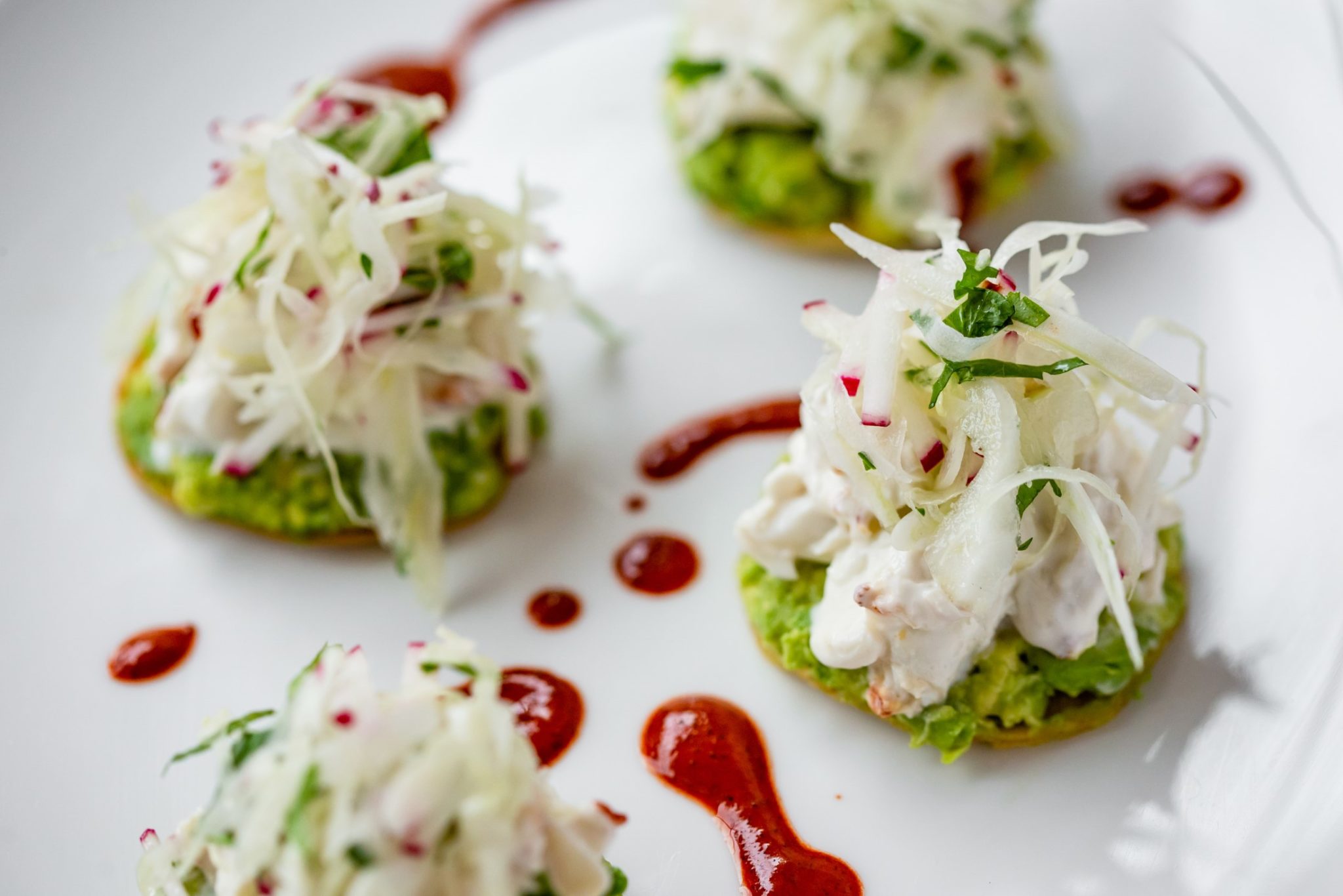 Crab Meat Tostadas with Avocado & Cabbage Slaw - PaperCity Magazine